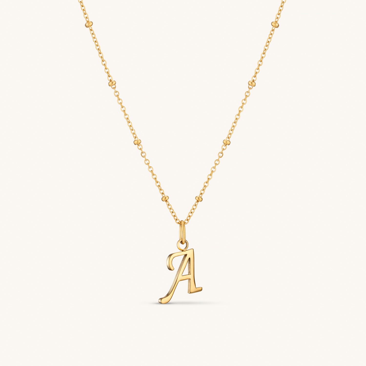 A Script Initial Necklace in Gold – Dylan Oaks